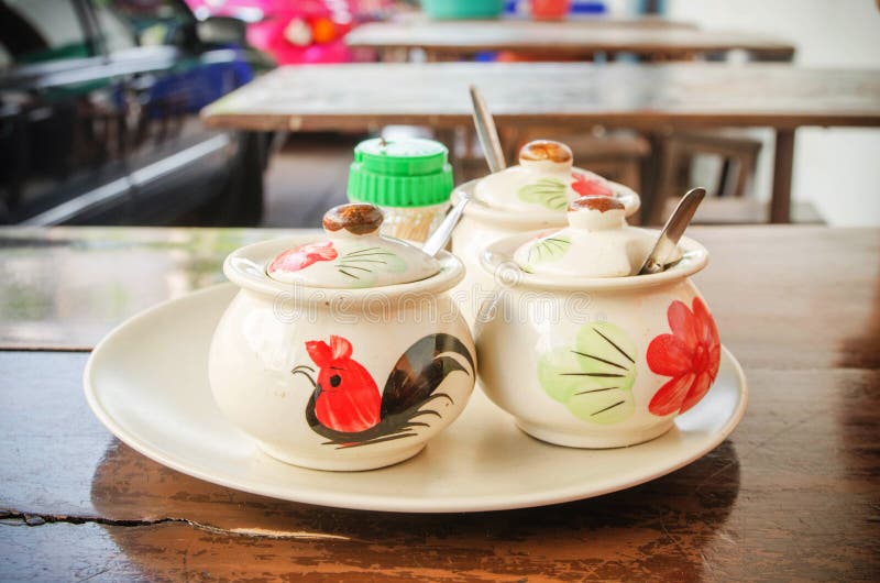 Ceramic Condiment Containers Stock Photo - Image of meal, condiment ...