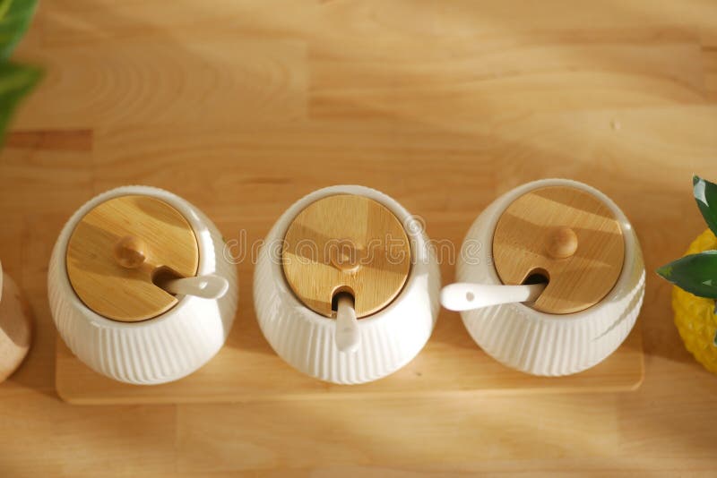 Ceramic Containers with Wooden Lids on a Wooden Tray in a Kitchen Stock ...
