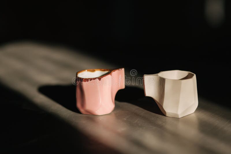 Ceramic Cup for Coffee on the Table. Right is Unfinished, Left is Ready ...