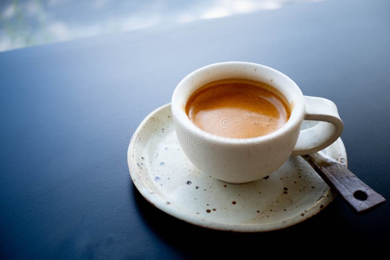 A Ceramic Cup of Espresso Double Shot Coffee on the Table Stock Photo ...