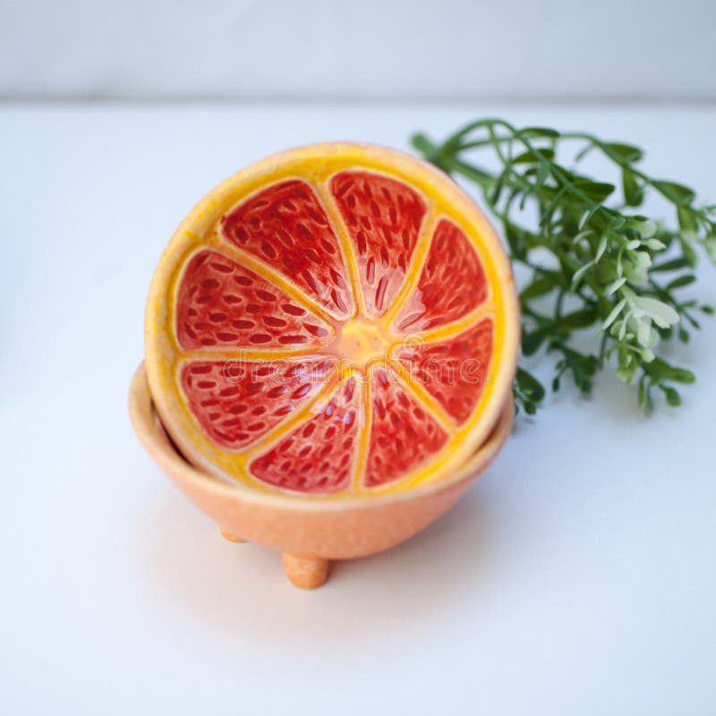 Ceramic Cup in the Form of Half a Grapefruit. Stock Image - Image of ...