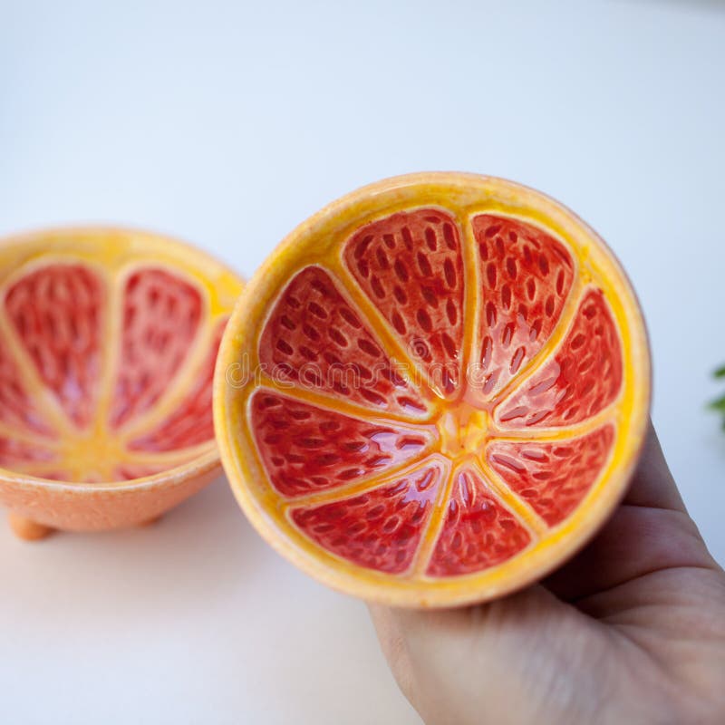 Ceramic Cup in the Form of Half a Grapefruit. Stock Image - Image of ...
