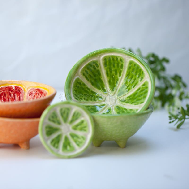 Ceramic Cup in the Form of Half a Lime. Stock Photo - Image of ...