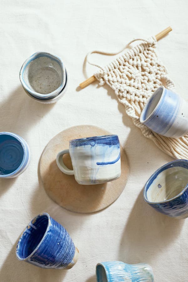 Ceramic cup on a textile stock image. Image of stoneware - 325199469