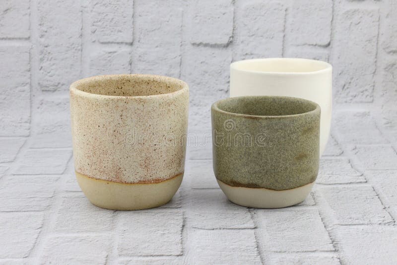 Ceramic Cups in Different Sizes and Colors. Stock Image - Image of ...