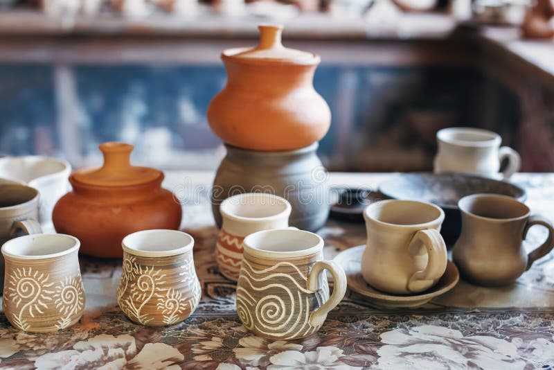 Ceramic Cups with Patterns and Ceramic Pots on the Shelf Stock Image ...