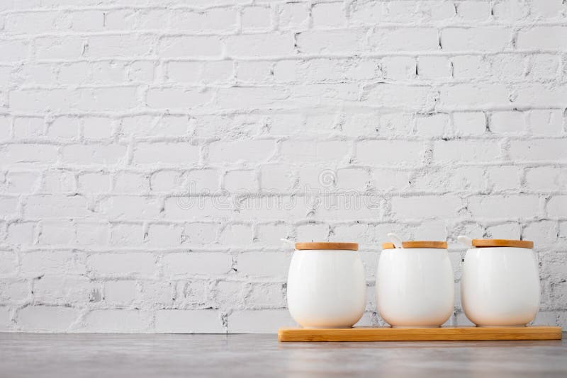 Ceramic Cups on White Brick Wall Texture Backgroun Stock Photo - Image ...