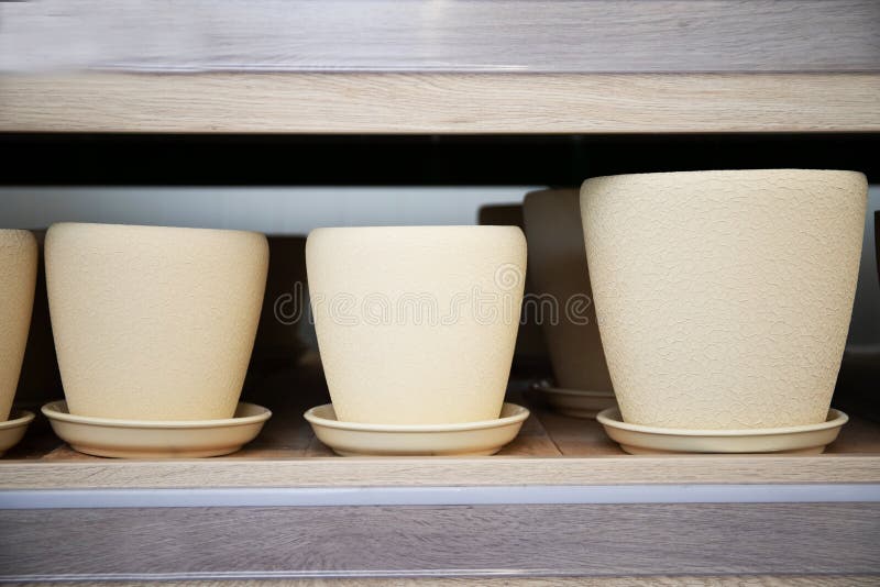 Ceramic Flower Pots on a Rack in a Store. Stock Image - Image of flower ...