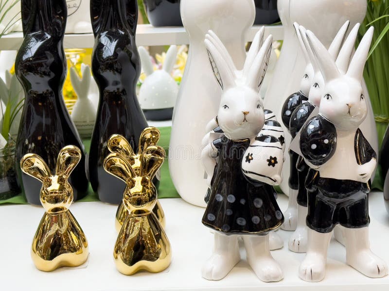 Ceramic and Gold Rabbit Figurines Displayed on Shelves, Easter Concept ...