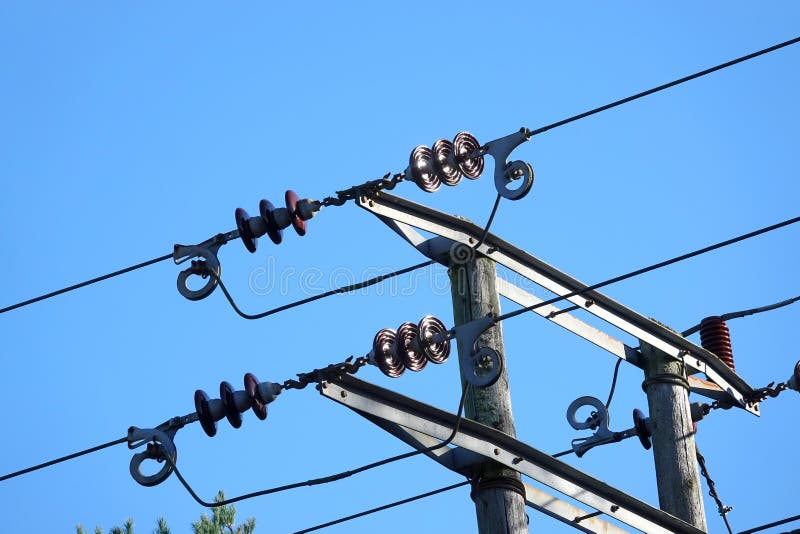 Ceramic Insulators on a Power Line Stock Photo - Image of wire, england ...