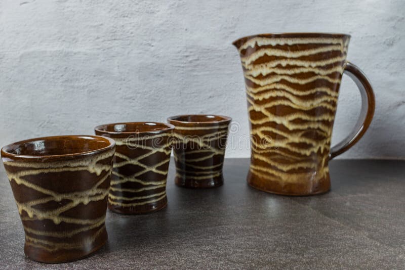 Ceramic Jug and Three Mugs. Stock Photo - Image of tableware ...