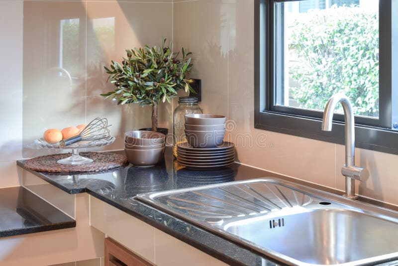 Ceramic Kitchenware on the Marble Worktop and Shelf Stock Photo - Image ...