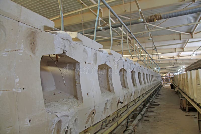 Ceramic mould in a factory stock image. Image of parts - 384315431