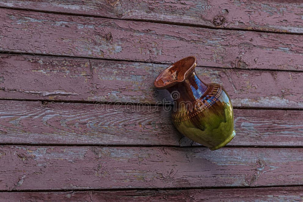 Ceramic Mud on an Old Plank Wall Stock Photo - Image of summer, decayed ...