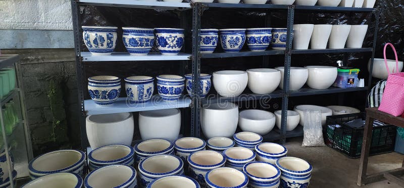 Ceramic Plant Pot with Blue Flower Motif Stock Photo - Image of giving ...