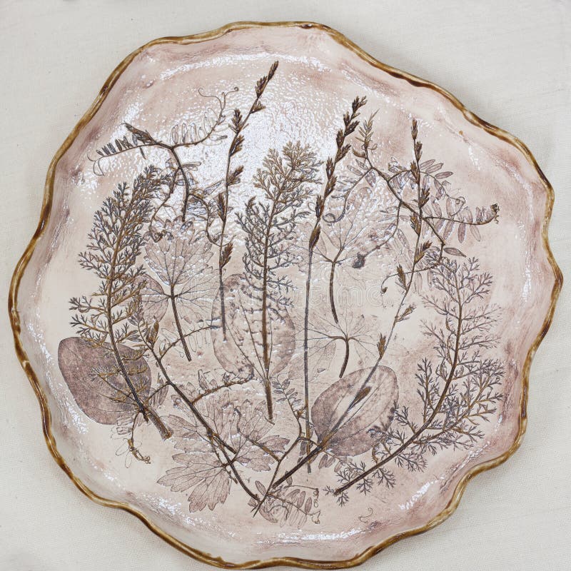Ceramic Plate with Grass Print Close-up Stock Photo - Image of ...