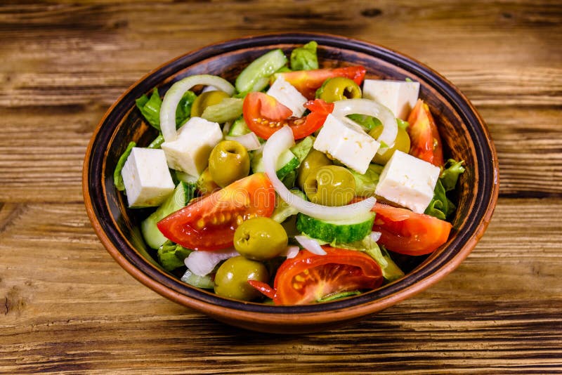 Ceramic Plate with Greek Salad on Wooden Table Stock Image - Image of ...