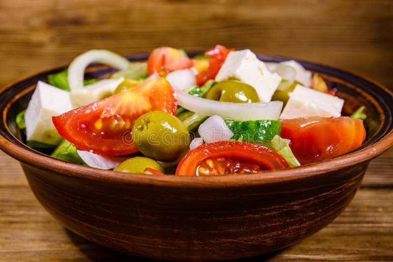 Ceramic Plate with Greek Salad on Wooden Table Stock Photo - Image of ...