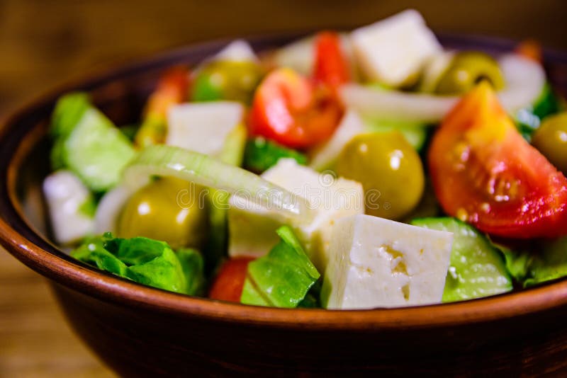 Ceramic Plate with Greek Salad on Wooden Table Stock Photo - Image of ...