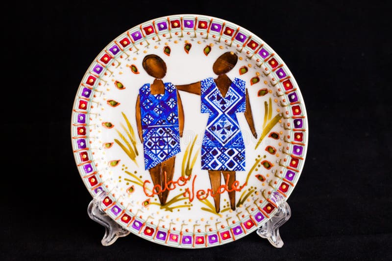 Ceramic Plate with the National Figure. Isolated on Black Stock Photo ...