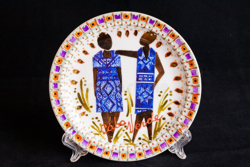 Ceramic Plate with the National Figure. Isolated on Black Stock Photo ...