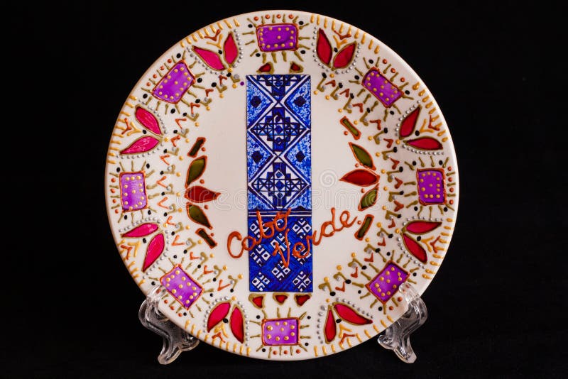 Ceramic Plate with the National Figure. Isolated on Black Stock Photo ...