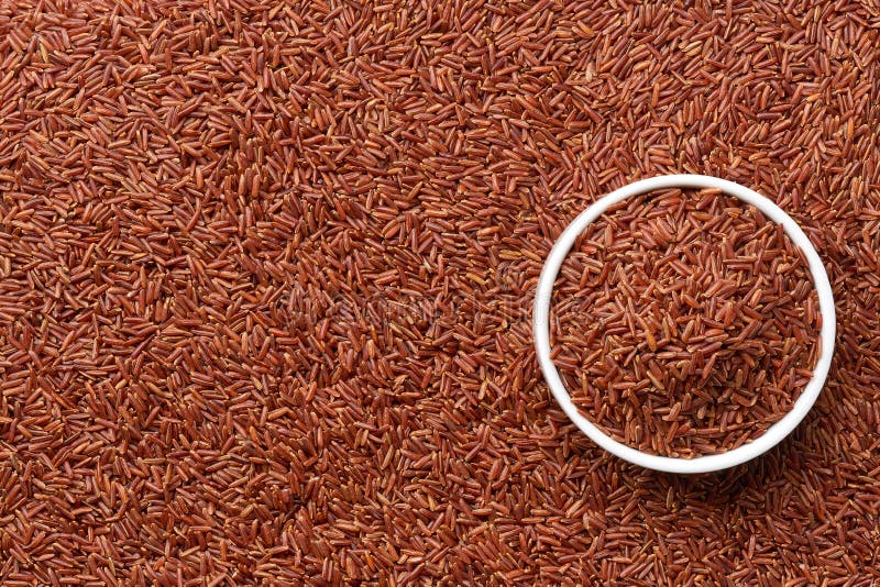 Ceramic Plate with Red Rice on a Red Rice Background Close-up Top View ...