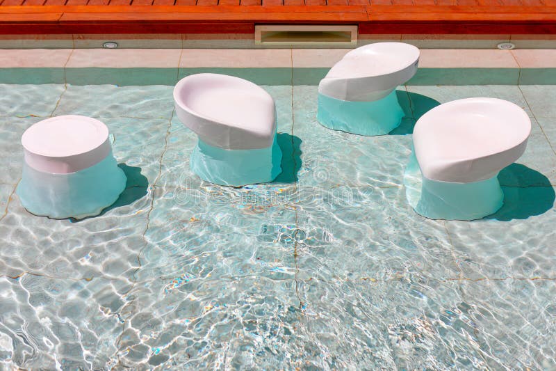 Ceramic Seats in Swimming Pool Stock Photo - Image of bath, resort ...