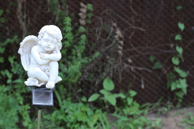 Ceramic Small White Figure of an Angel with a Flashlight in the Green ...