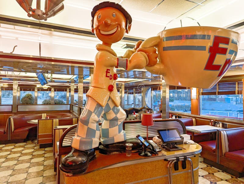 Ceramic Statue of Man with Coffee Cup in Retro Diner Editorial Photo ...