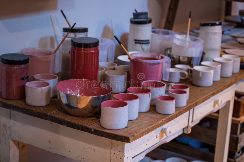 Ceramic Studio Display of Artisan Pottery Cups and Glazing Tools Stock ...