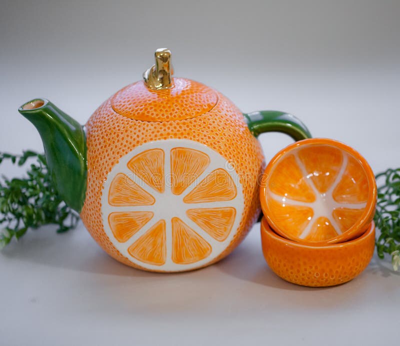 Ceramic Teapot Handmade Orange with a Gold Leaf Stock Photo - Image of ...