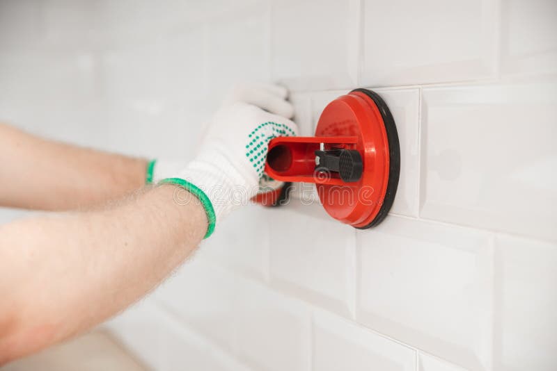 Ceramic Tile with Chamfer Hands in Process of Laying White Rectangular ...