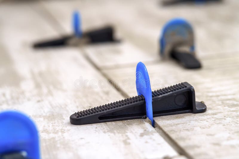 Ceramic Tile Leveling System. Apparatus for Laying Stoneware Tiles ...