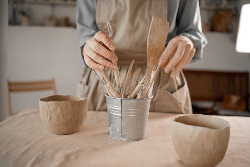 Ceramic Tool. Ceramic Work Tools in an Art Workshop. the Hands of the ...