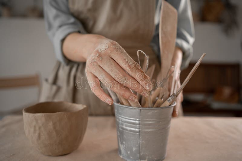Ceramic Tool. Ceramic Work Tools in an Art Workshop. the Hands of the ...