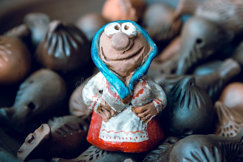 Handmade Ceramic Toy at a City Fair. Ceramic Toys. the Old Grandmother ...