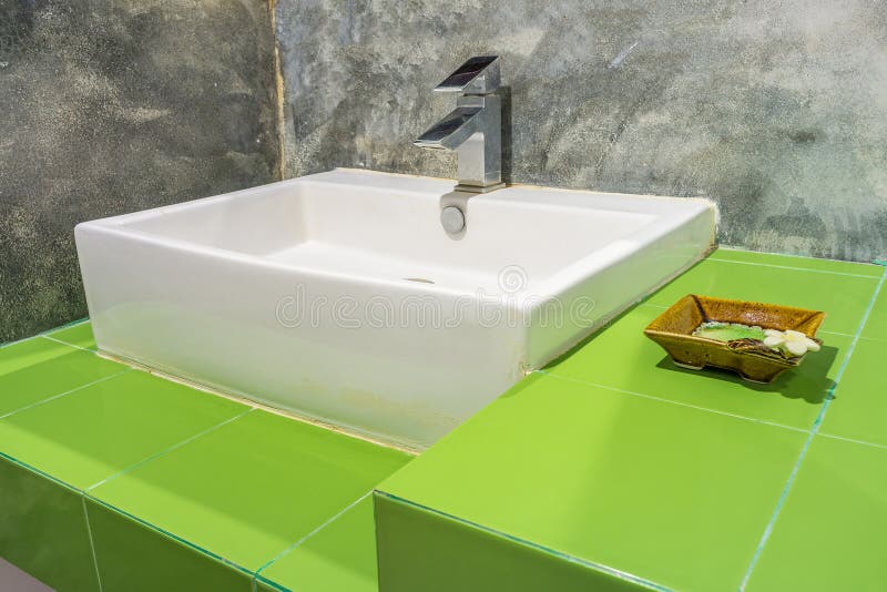 Ceramic Washbasin and Bowl on Green Ceramic Tiles Counter Stock Photo ...