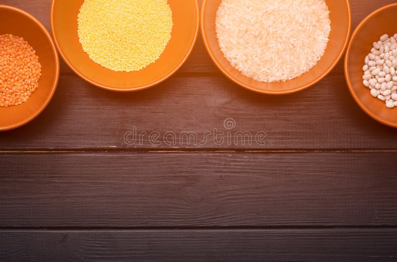 Cereal in Clay Plates on a Wooden Table. Stock Image - Image of culture ...