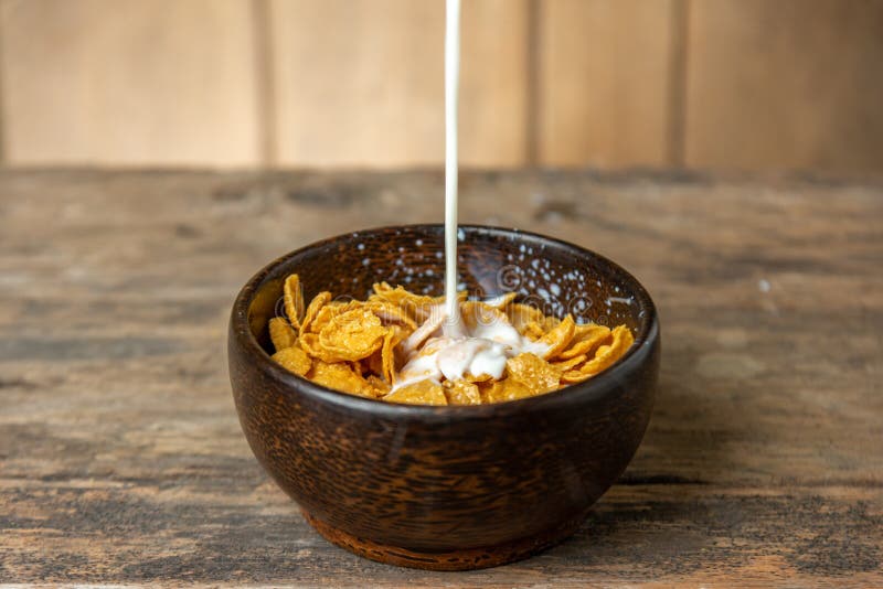 Cereal in Wooden Bowl with Milk Splash Stock Photo - Image of fresh ...