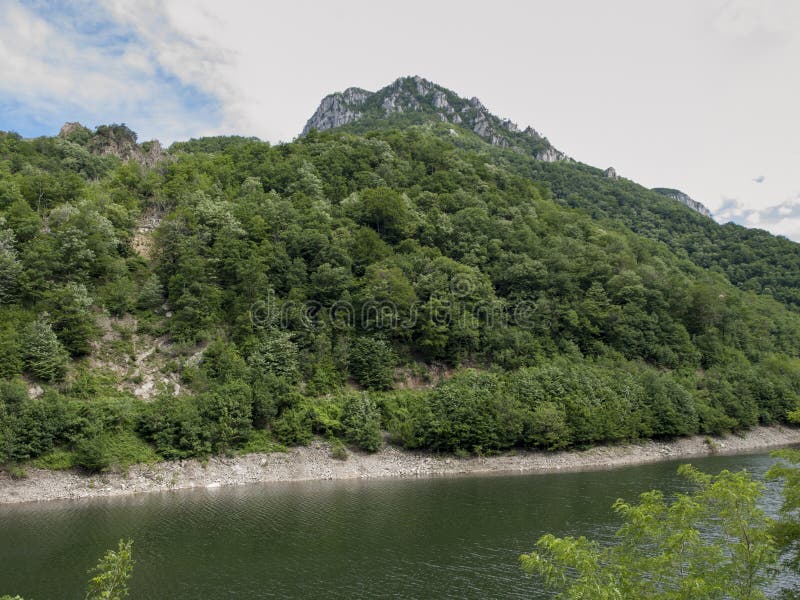 Cerna River at Prisaca Lake Stock Photo - Image of movement, motion ...