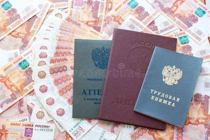 A Certificate, a Red Diploma and a Work Book are on the Five Thousandth ...