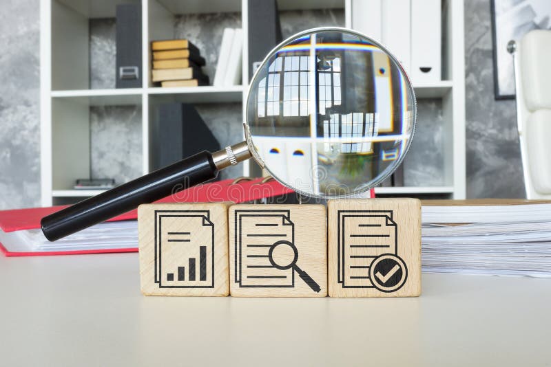 Certification and Audit Symbols Next To a Magnifying Glass. Stock Image ...