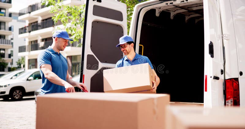 Certified Mover Unloading Van and Carrying Boxes for Approved Moving ...