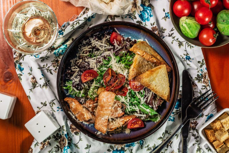 Cesar Salad. Salad with Marinated Salmon, Eggs, Parmesan and Tomatoes ...