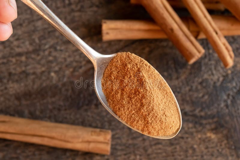 Ceylon Cinnamon Powder on a Spoon, with Cinnamon Sticks Stock Photo ...