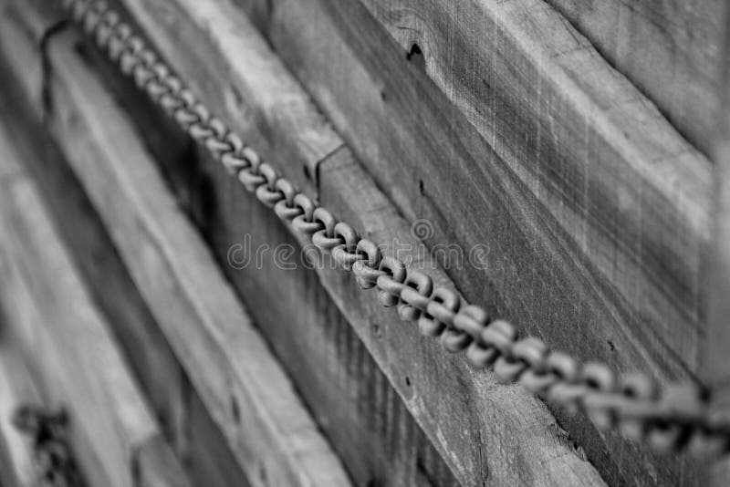 Chain Along the Timber Fence Stock Image - Image of strong, chain: 50026595