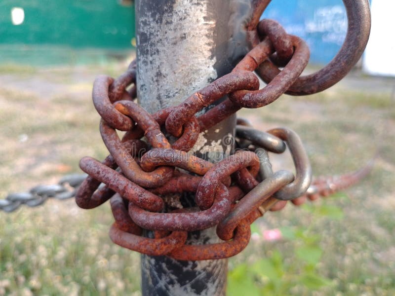A Chain that Binds an Iron Pole Stock Photo - Image of iron, connection ...