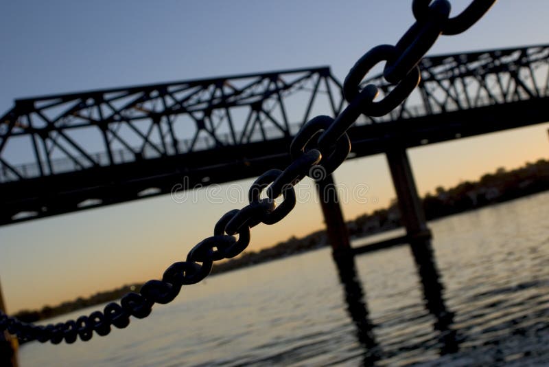 Chain and Bridge stock photo. Image of reflections, sunset - 1282914