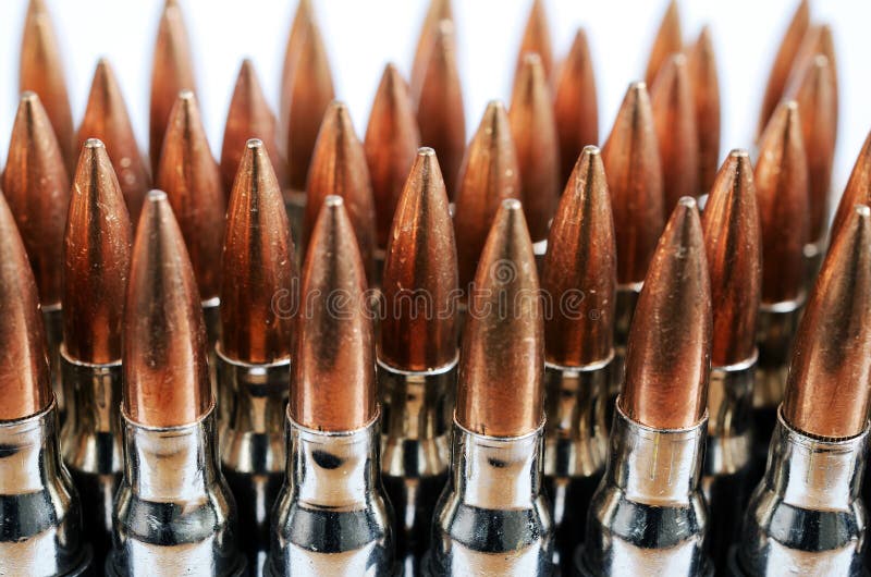 Chain of Bullets Over White, Closeup Stock Photo - Image of metal ...